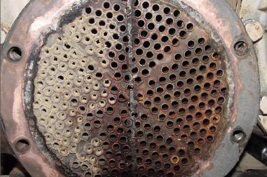 Ultrasonic Cleaning of Fouling and Scales in Shell & Tube Heat exchangers